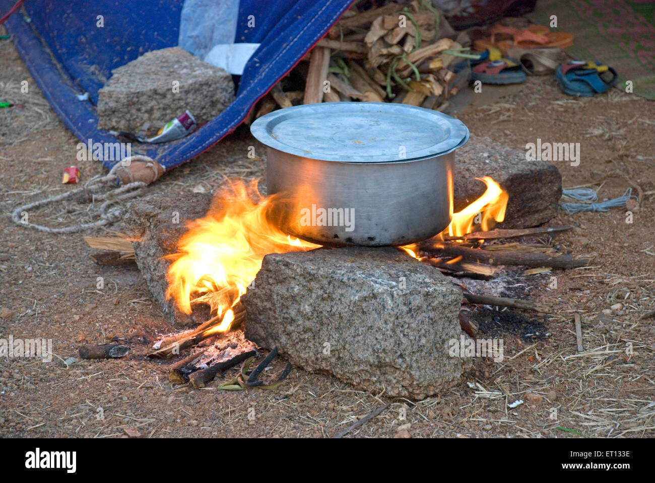 Cooking on firewood ; Keesaragutta temple ; Hyderabad ; Andhra Pradesh ...