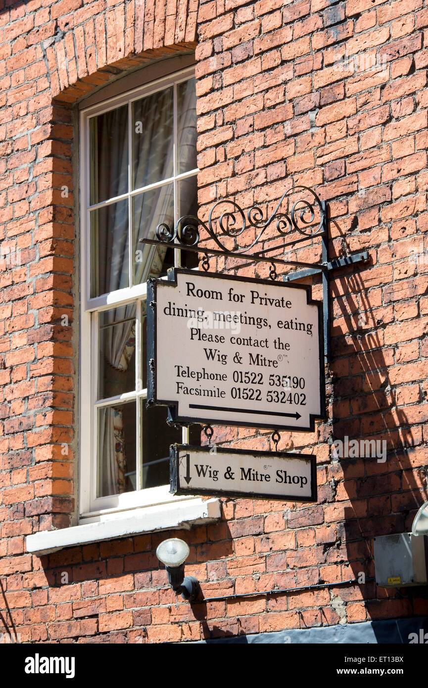 Wig and Mitre Shop sign on building, Steep Hill, Lincoln, Lincolnshire ...
