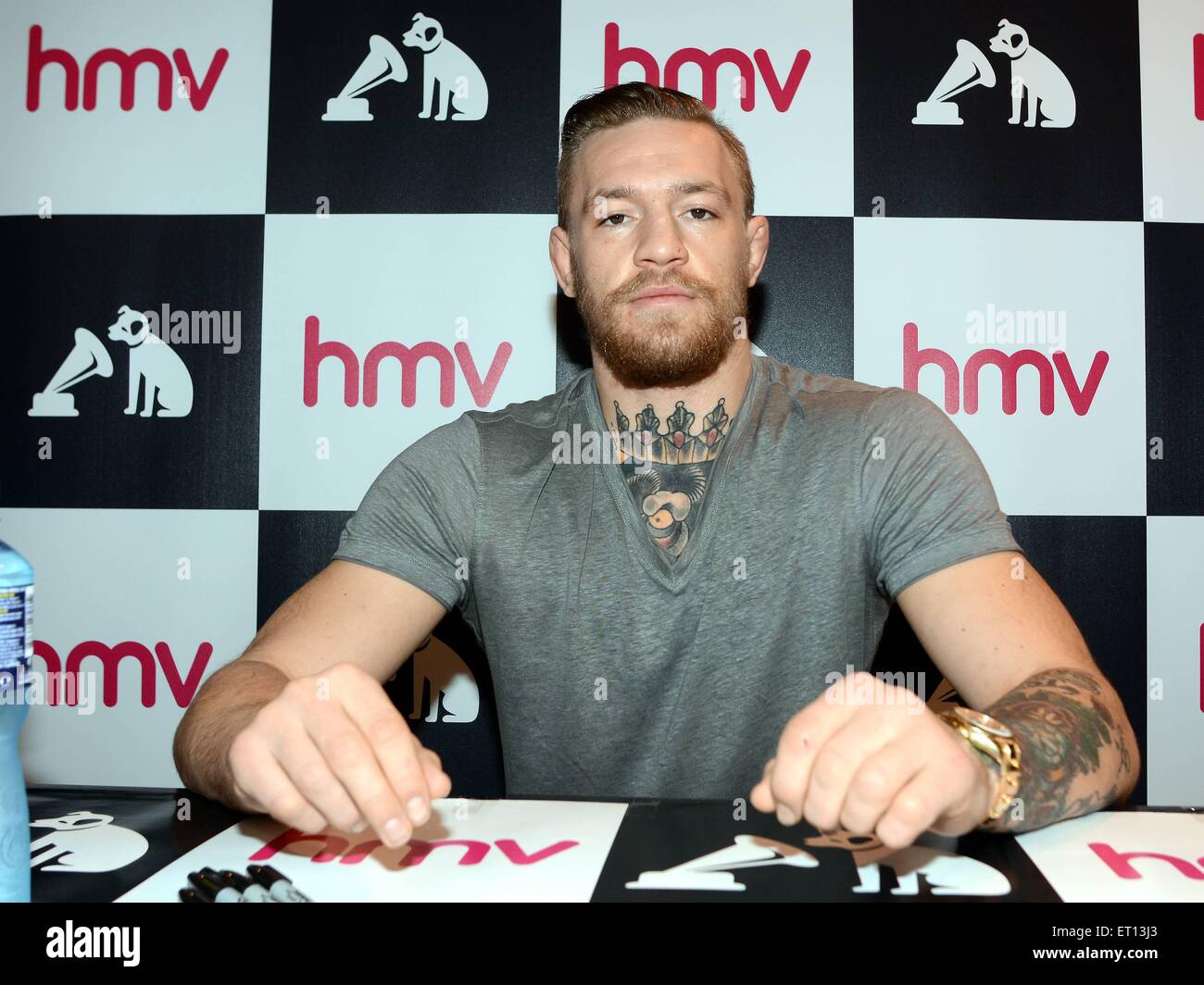 UFC fighter Conor McGregor signs copies of his DVD documentary ...