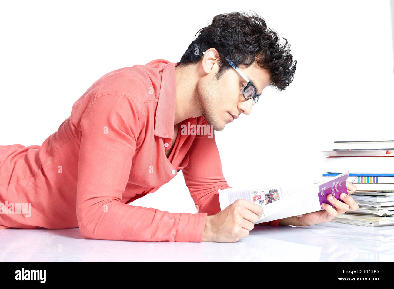 Indian Man Reading High Resolution Stock Photography and Images - Alamy