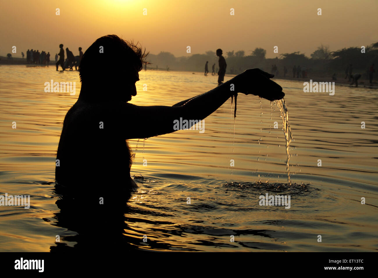 Praying to Sun God ; Vautha ; Gujarat ; India Stock Photo - Alamy