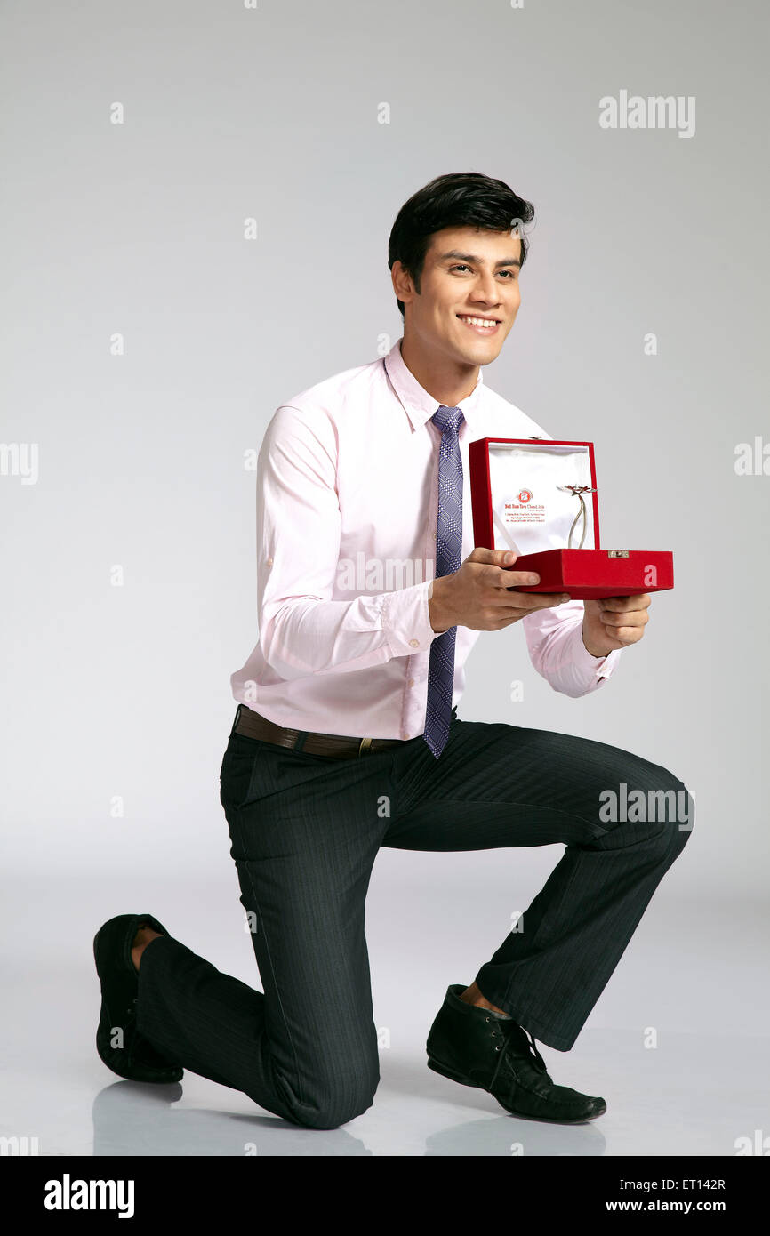 Man Holding Open Gift Box India Asia MR#790E Stock Photo - Alamy