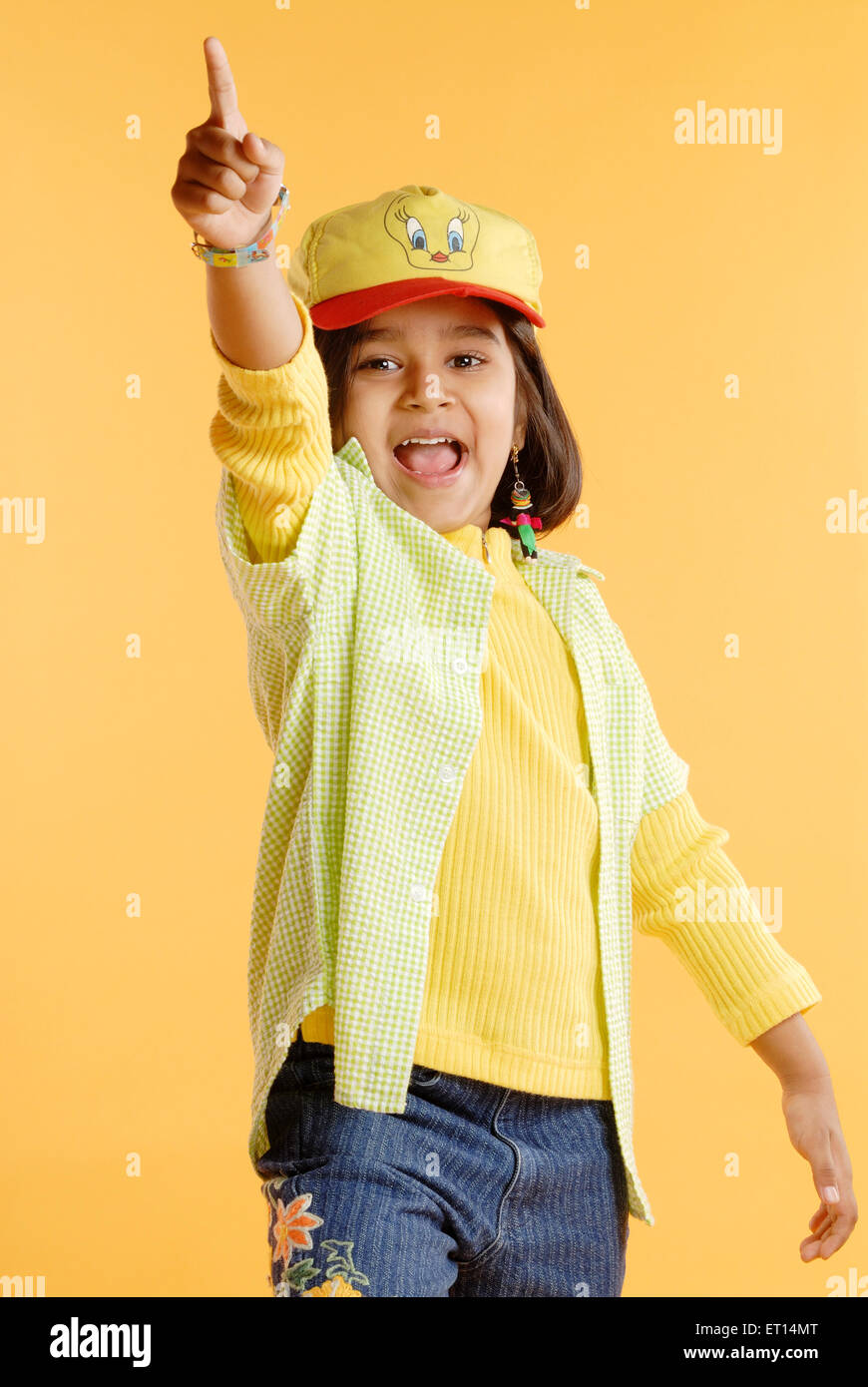 Young girl raised arm pointing finger showing out sign MR#719D Stock ...