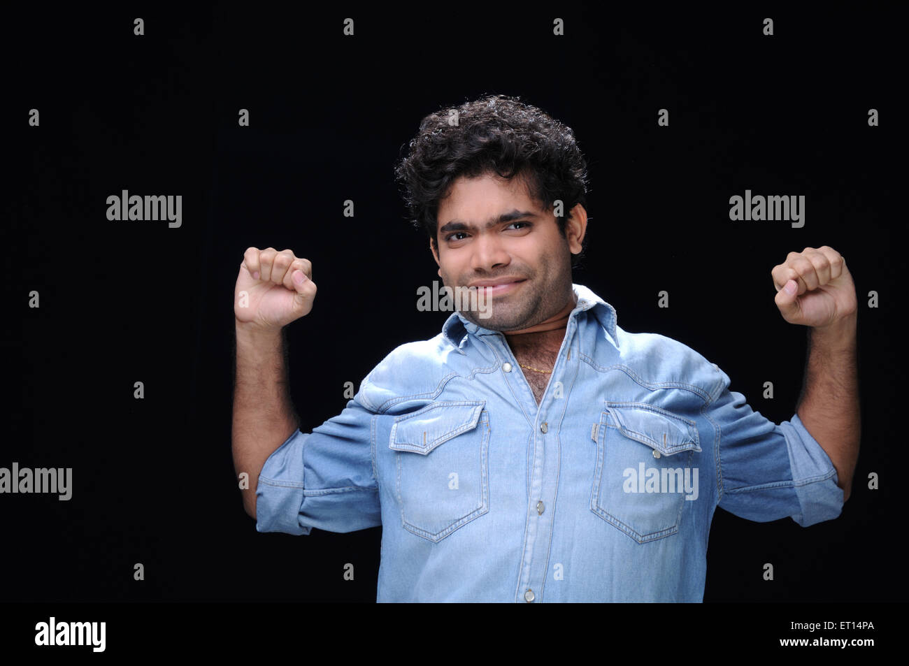 Man raised both arms MR#719F Stock Photo - Alamy
