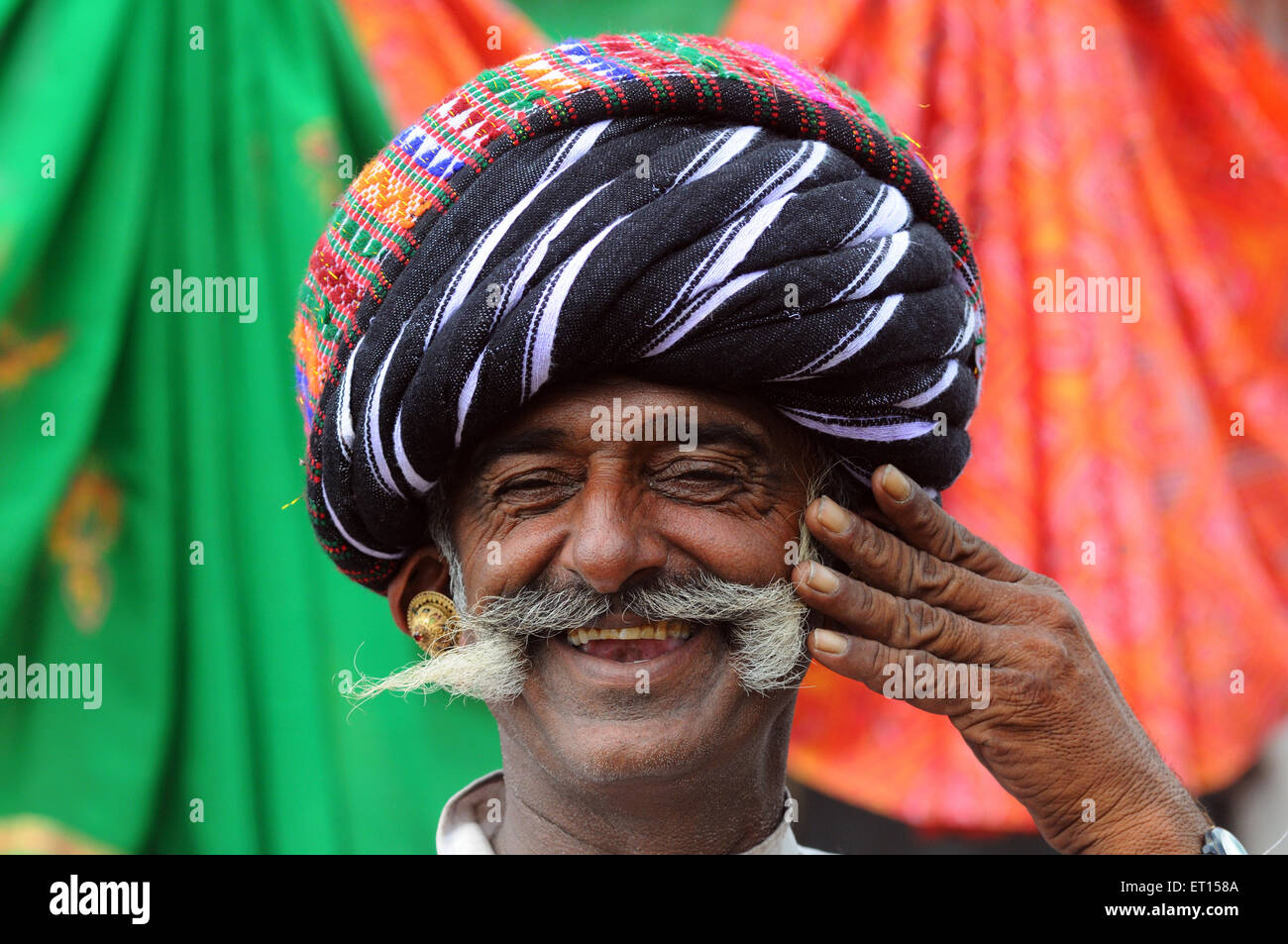 Indian man with head covered hi-res stock photography and images - Alamy