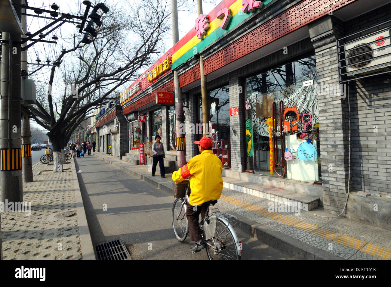 Cyclist in the street, Beijing, China, Chinese Stock Photo - Alamy