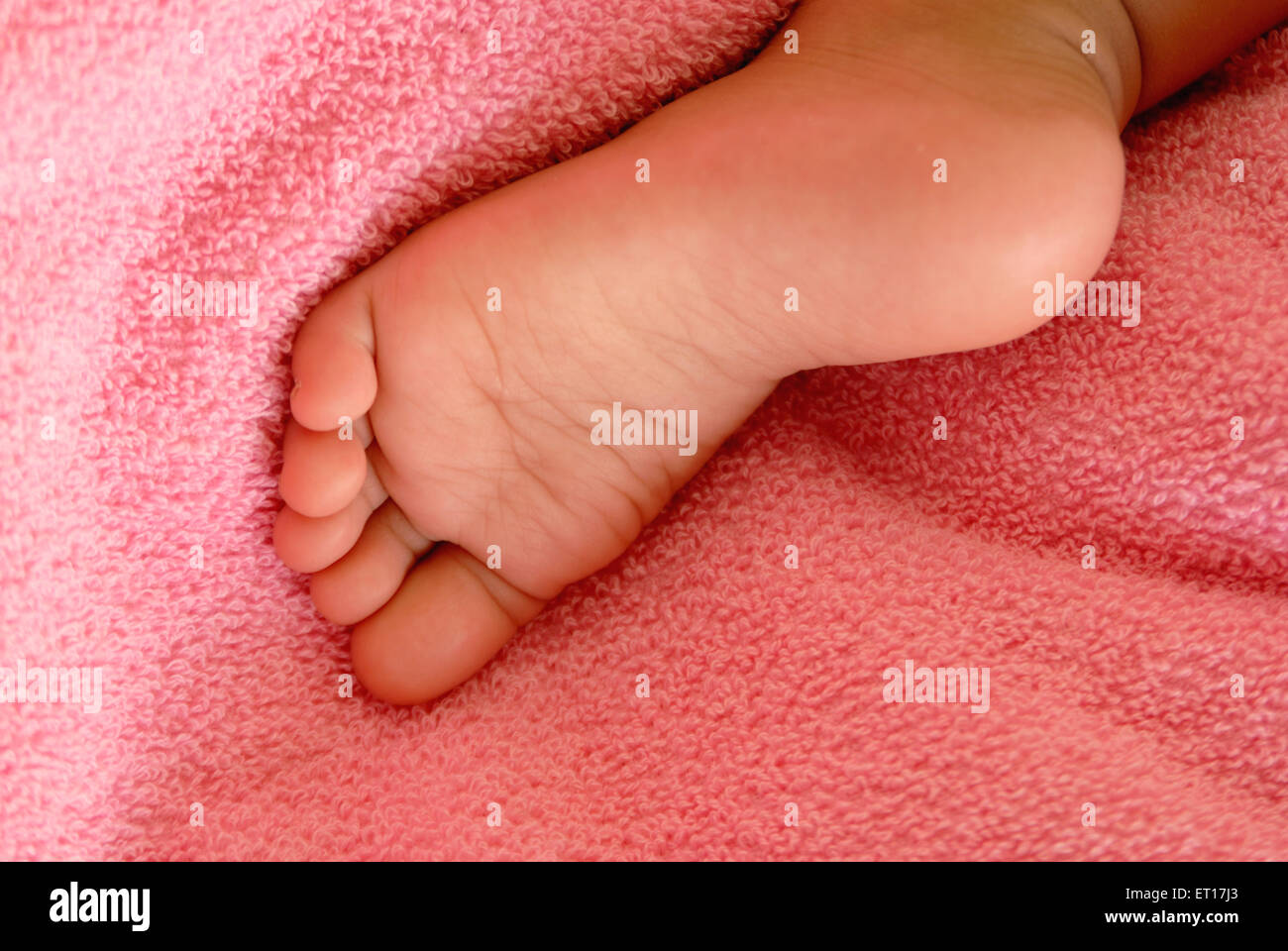 Indian baby boys feet hi-res stock photography and images - Alamy