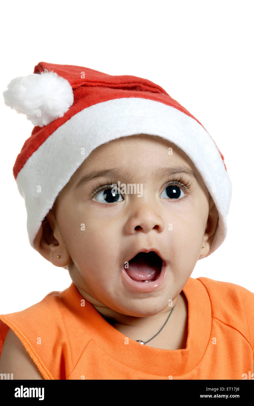 Baby boy making funny face ; Bombay Mumbai ; Maharashtra ; India MR#152 ...