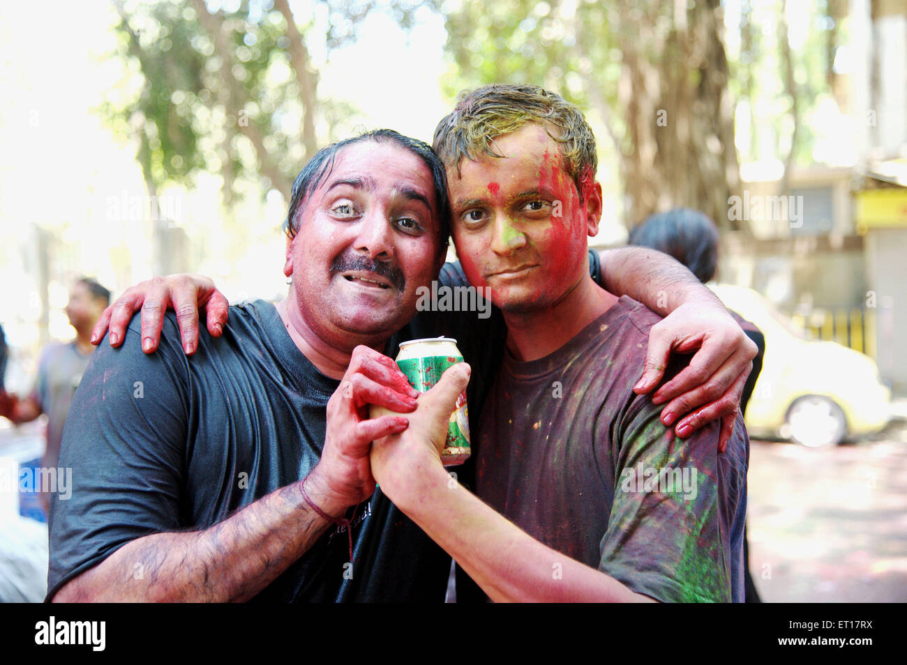 Indian friends fighting for beer can celebrating Holi Festival - MR#364 ...