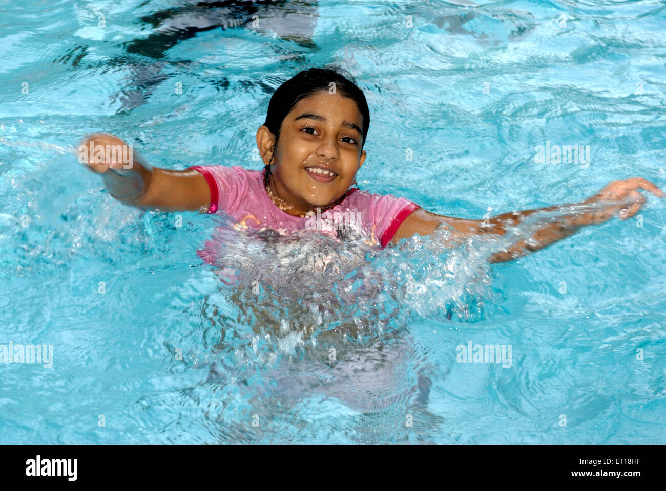 Swimming in swimming pool hi-res stock photography and images - Alamy