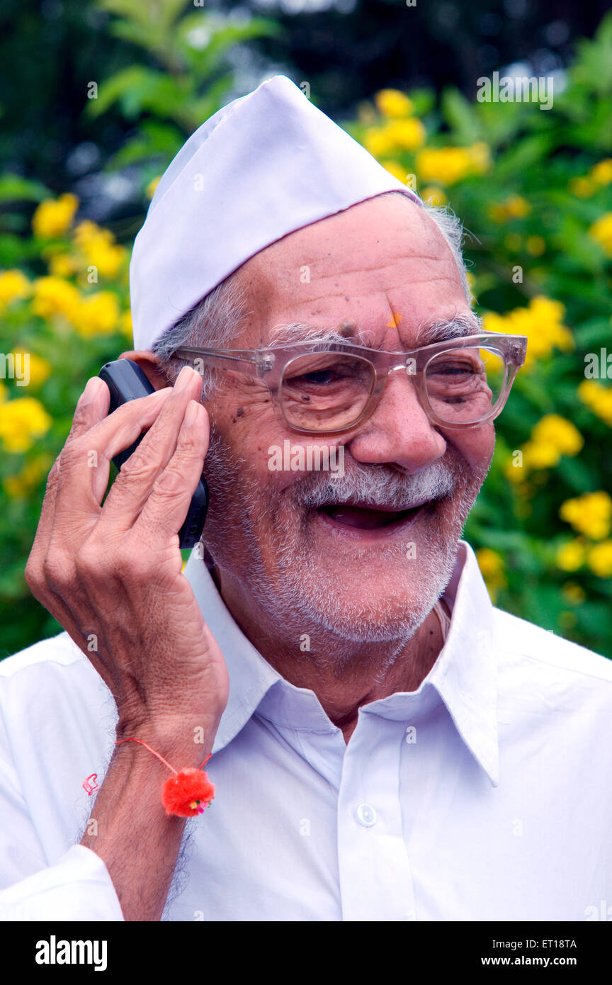 Indian Old Man Talking on Mobile MR#784M Stock Photo - Alamy