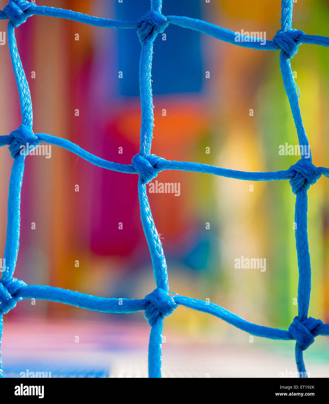 Blue net closeup in children playground. Colorful plastic background ...