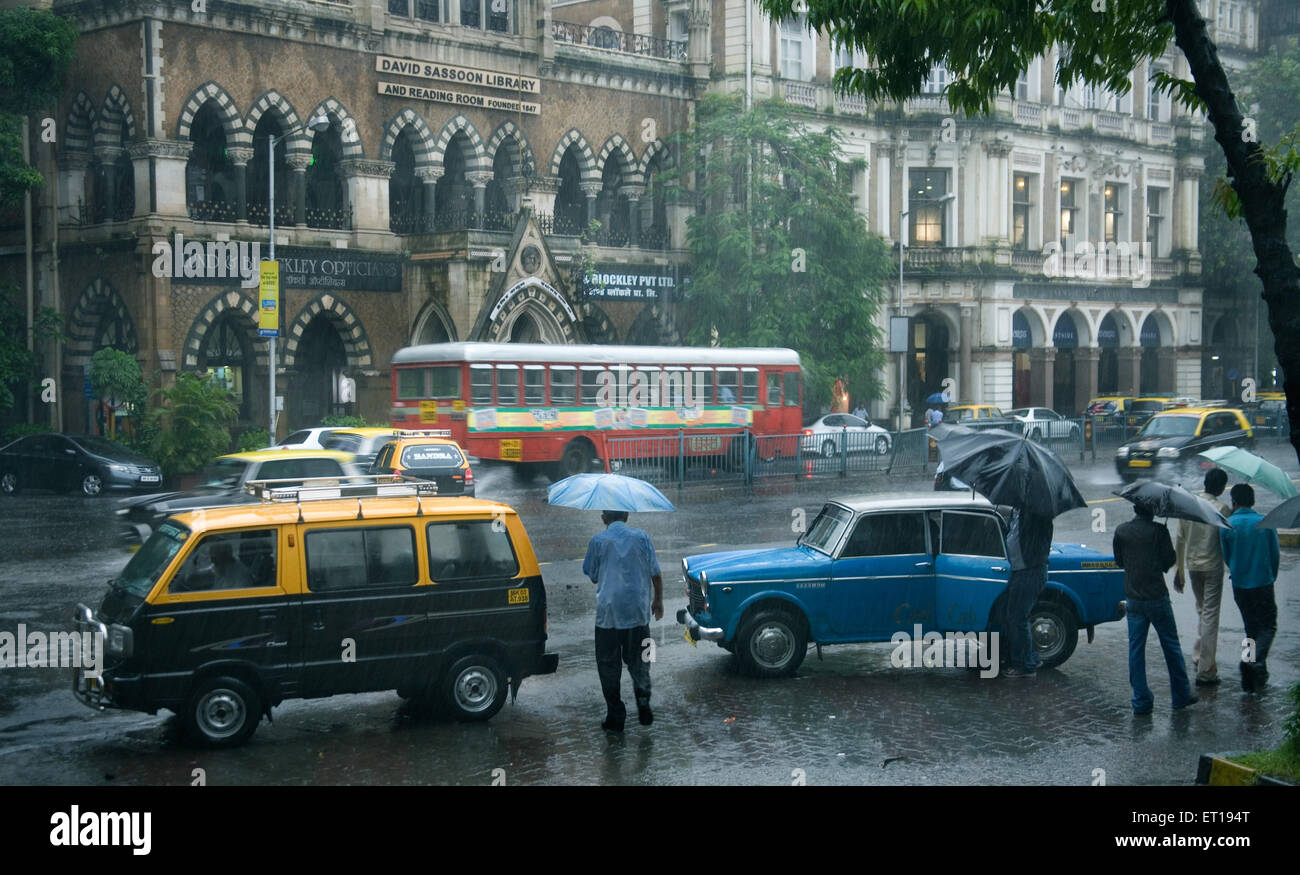 Street scene in monsoon rain ; Bombay Mumbai ; Maharashtra ; India ...