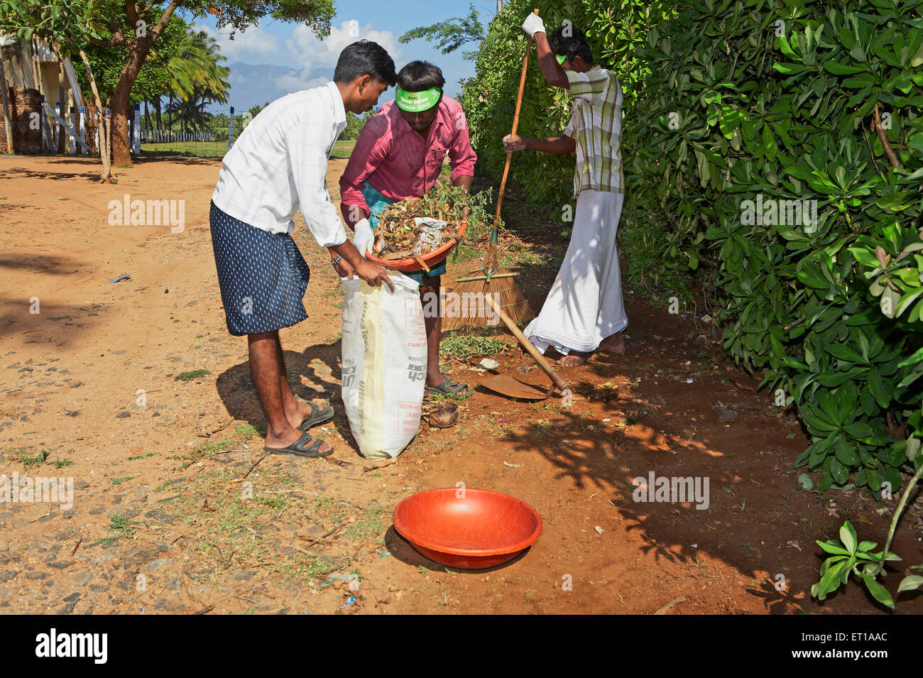 Volunteers cleaning road, NGO, Chinmaya Organization of Rural ...