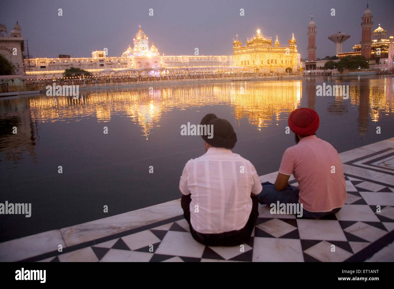 Two Sikh religion men looking decorated Hari mandir Sahib Dussera ...