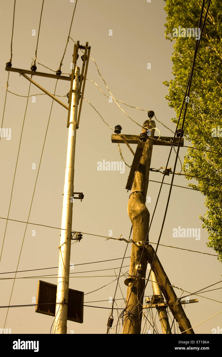 Old and new electricity pole ; Srinagar ; Jammu and Kashmir ; India ...