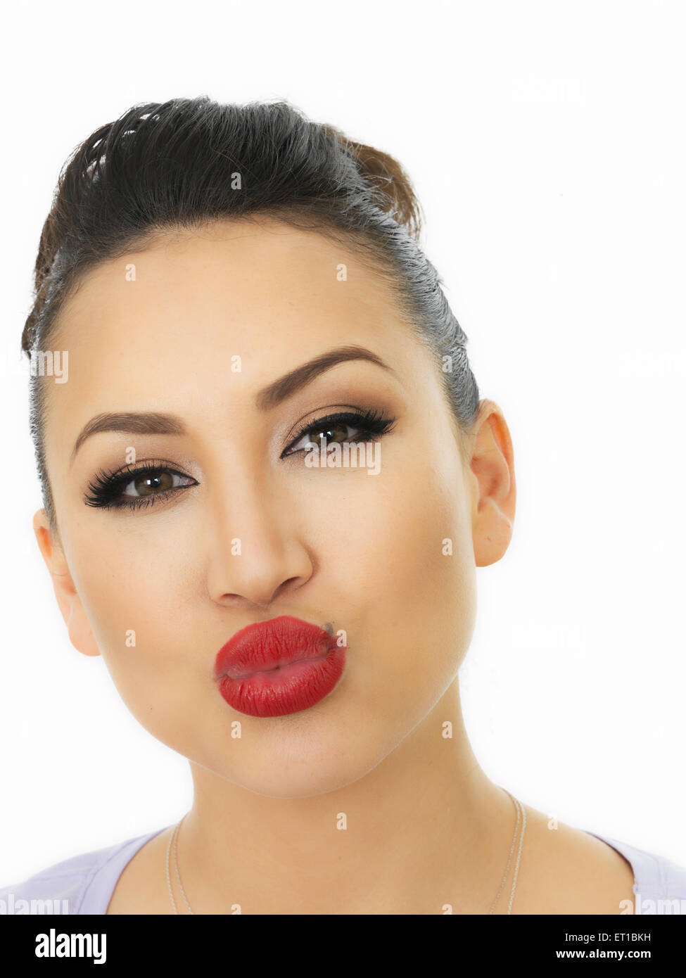 Beautiful Sultry Young Hispanic Woman In Her Twenties Blowing Kisses To ...