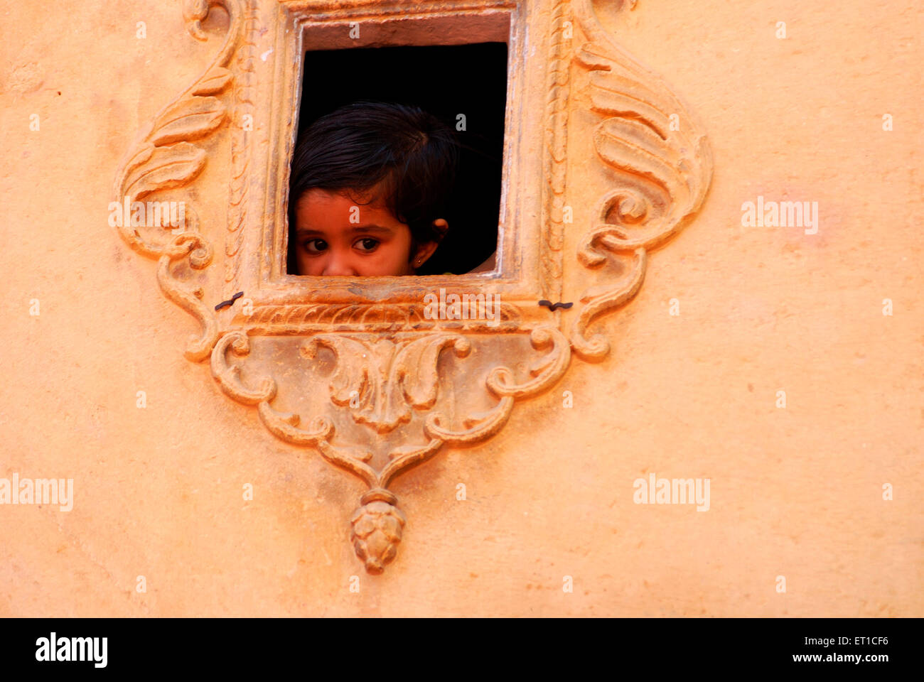 Child peeping window hi-res stock photography and images - Alamy