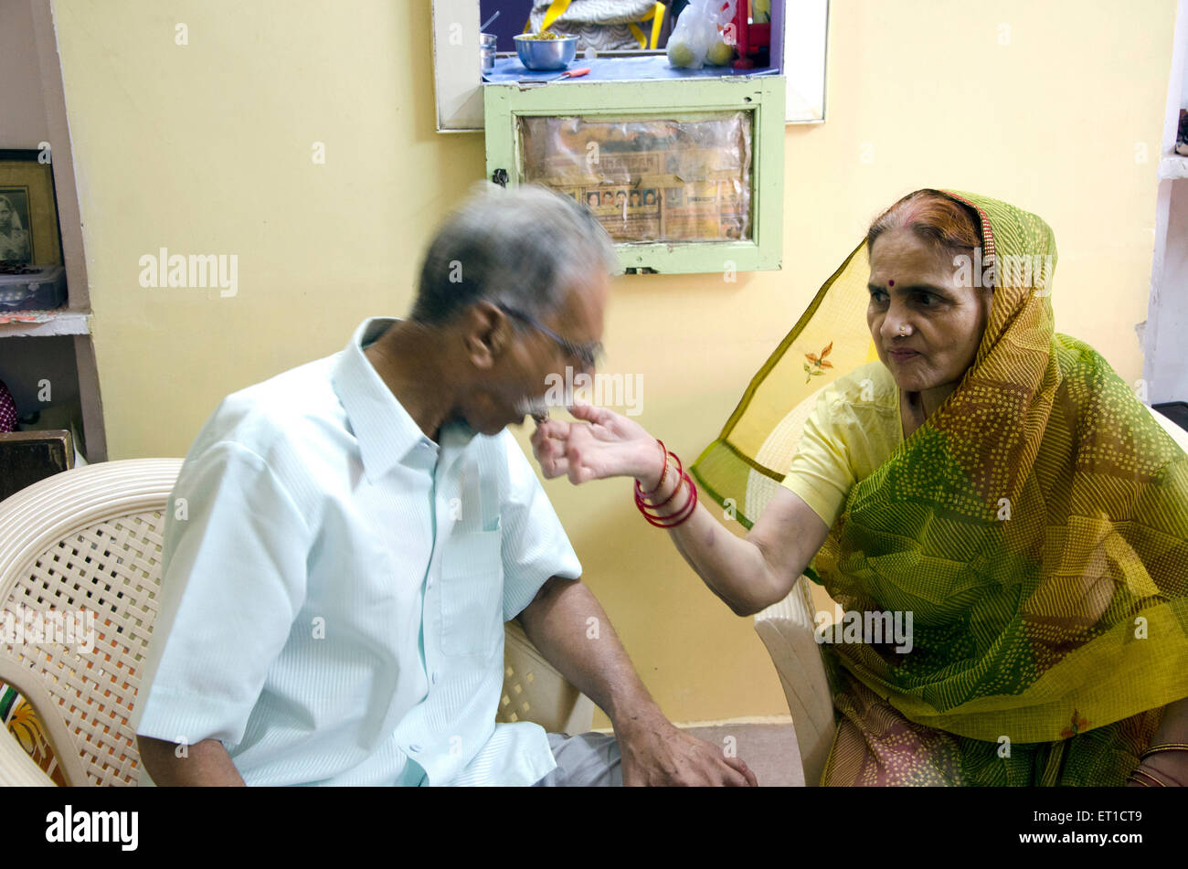 Indian Women Breastfeeding Their Husband