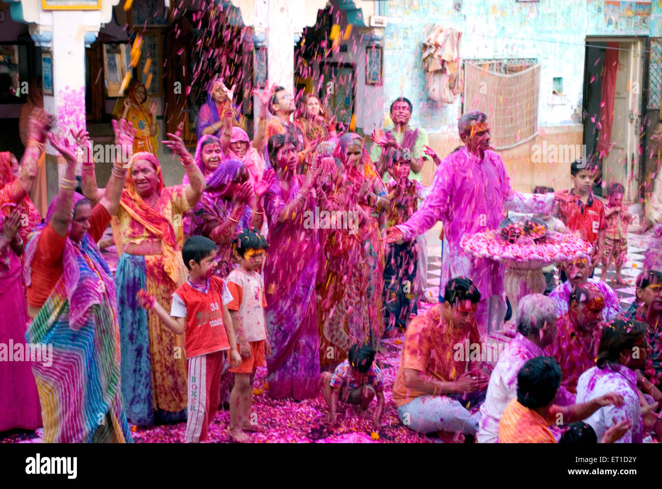 People playing with gulal on holi festival at Ghanshyam ji Temple ...