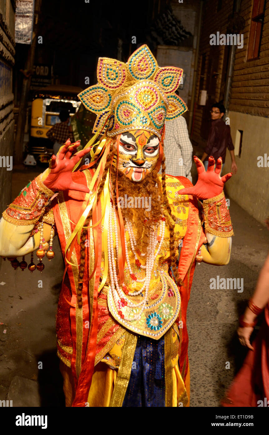 A girl in disguise of Narsingh Avtar on occasion of Dheenga Gavar ...