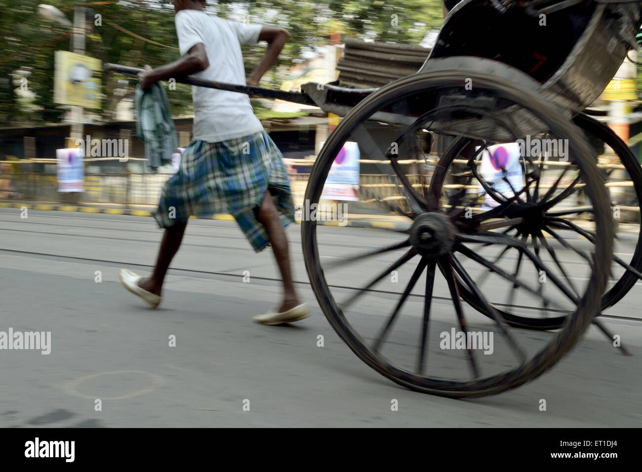 Pulling rickshaw calcutta hi-res stock photography and images - Alamy