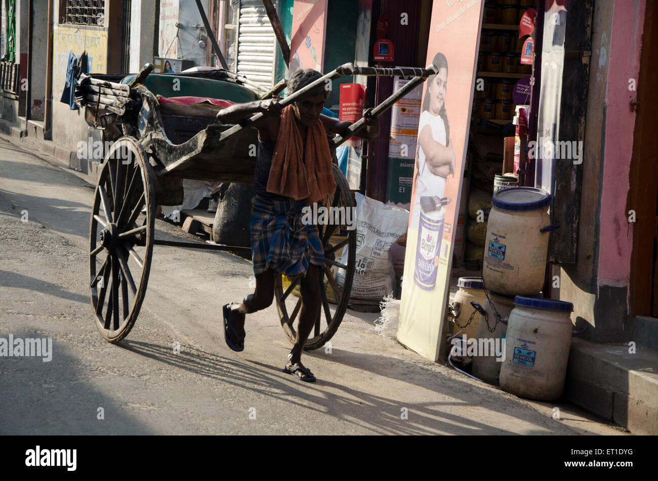 man pulling hand rickshaw Kolkata West Bengal India Asia Stock Photo ...