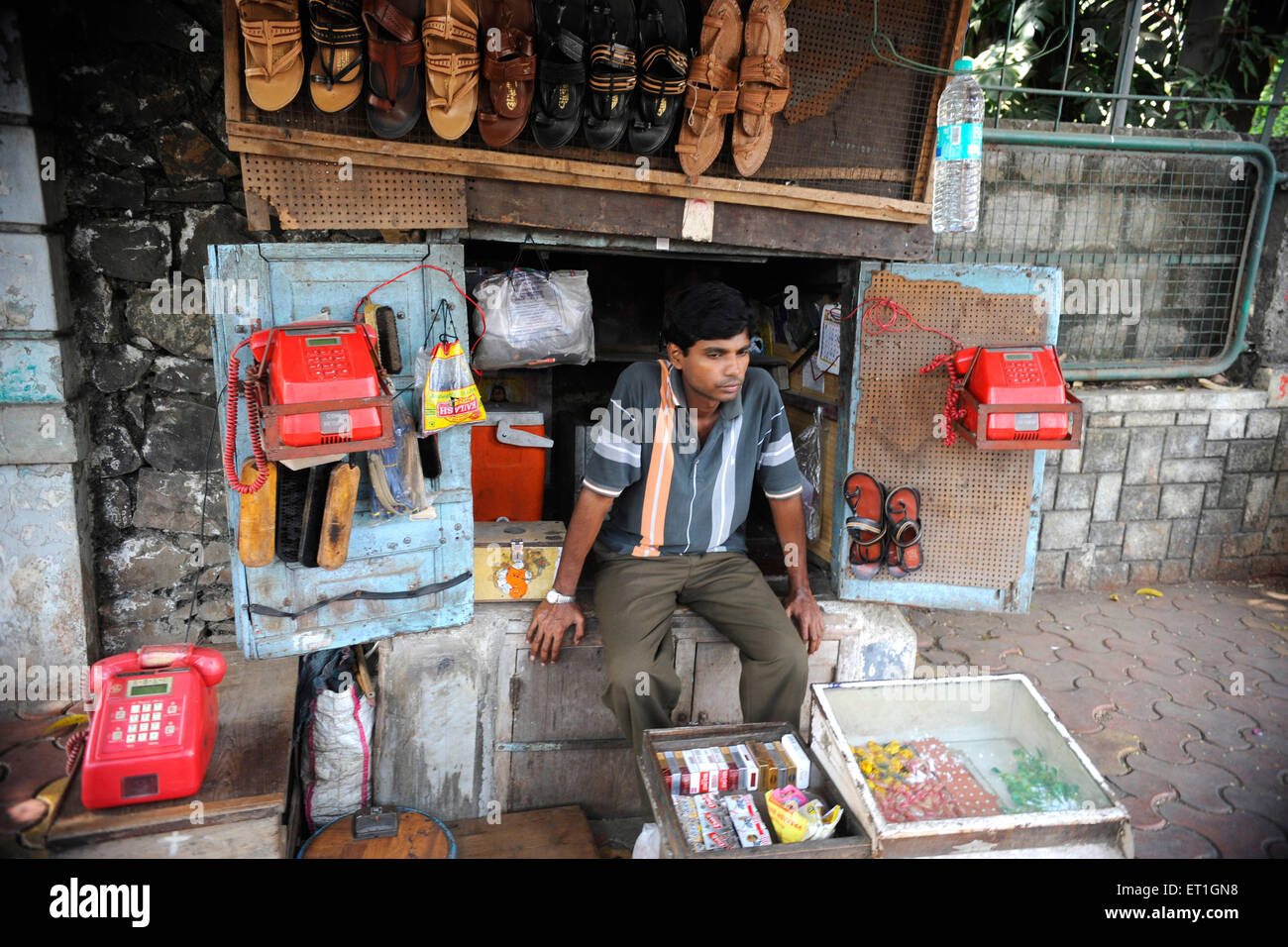 Shoemaker or cobbler sitting in shop ; India Stock Photo - Alamy