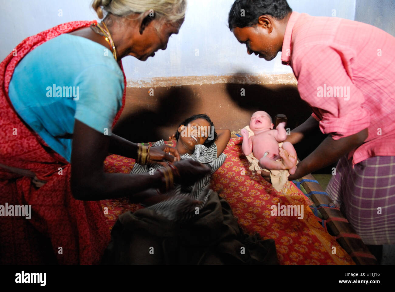 Delivery baby with mother old hi-res stock photography and images - Alamy