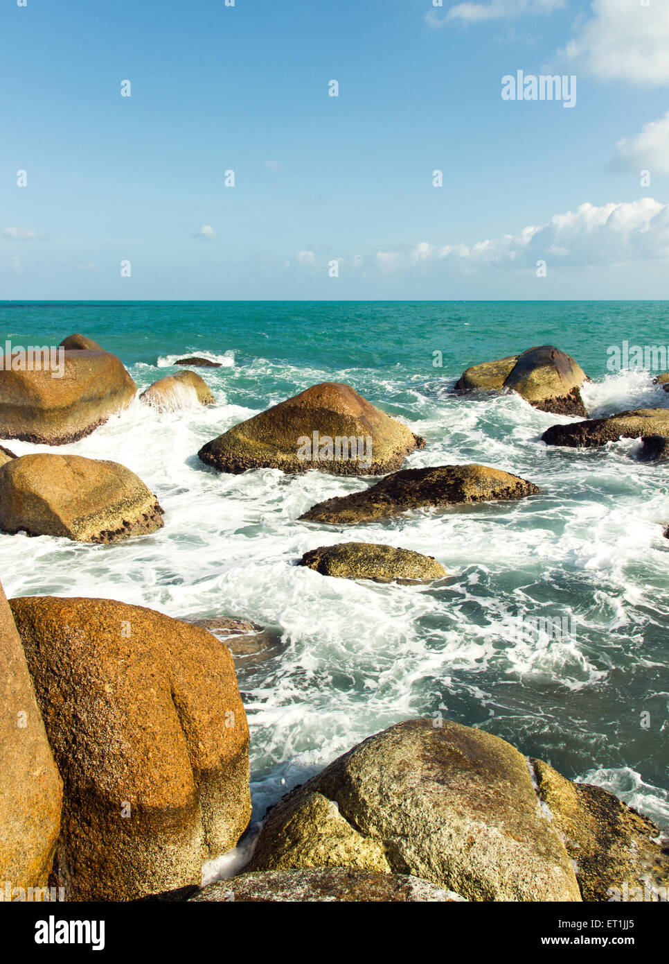 ocean waves, stones and blue sky. summer holiday seascape Stock Photo ...