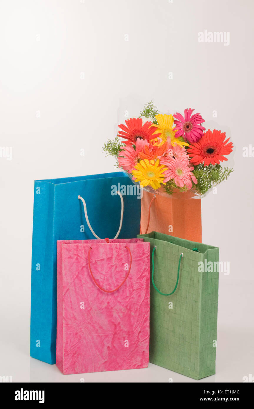 colorful paper shopping bags with colourful flowers Stock Photo - Alamy