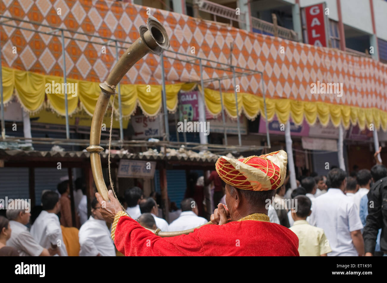 Man blowing trumpet Pune Maharashtra India Asia Spt 2011 Stock Photo ...