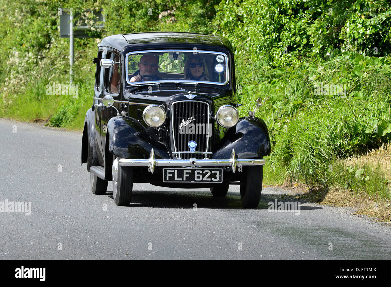 1936 Austin Ten 4-door black saloon vintage car on country road ...