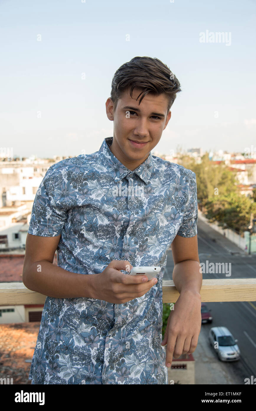 Teenager checking phone hi-res stock photography and images - Alamy