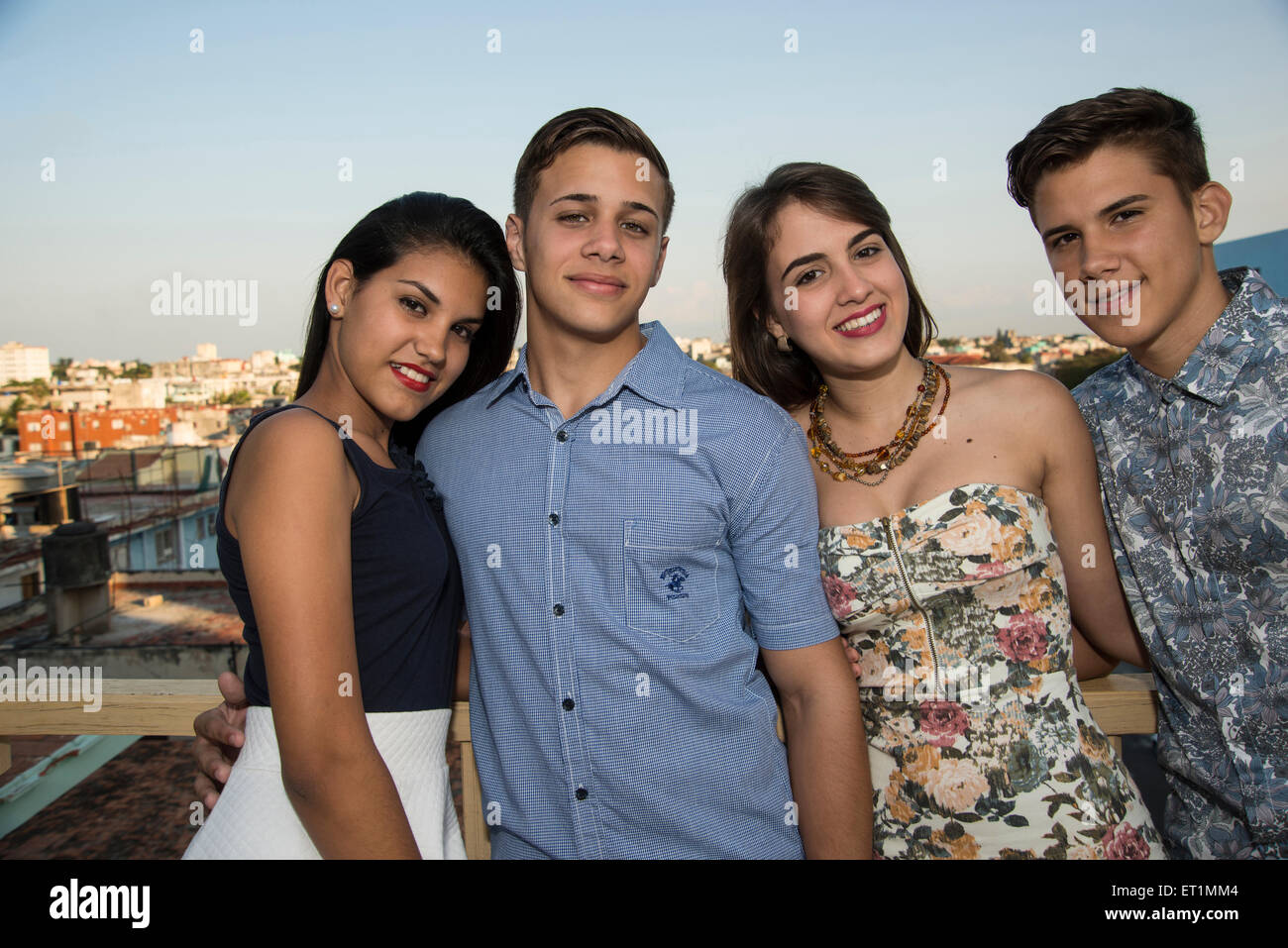 Teenagers having fun together outdoors Stock Photo - Alamy