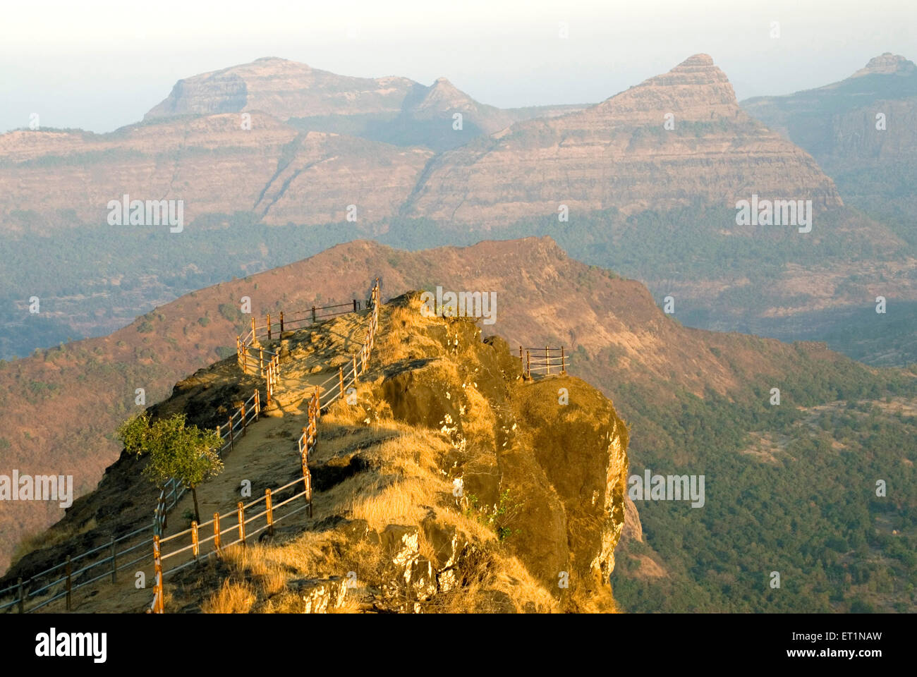 Takmak tok in morning light and Sahyadri mountains range at fort Raigad ...