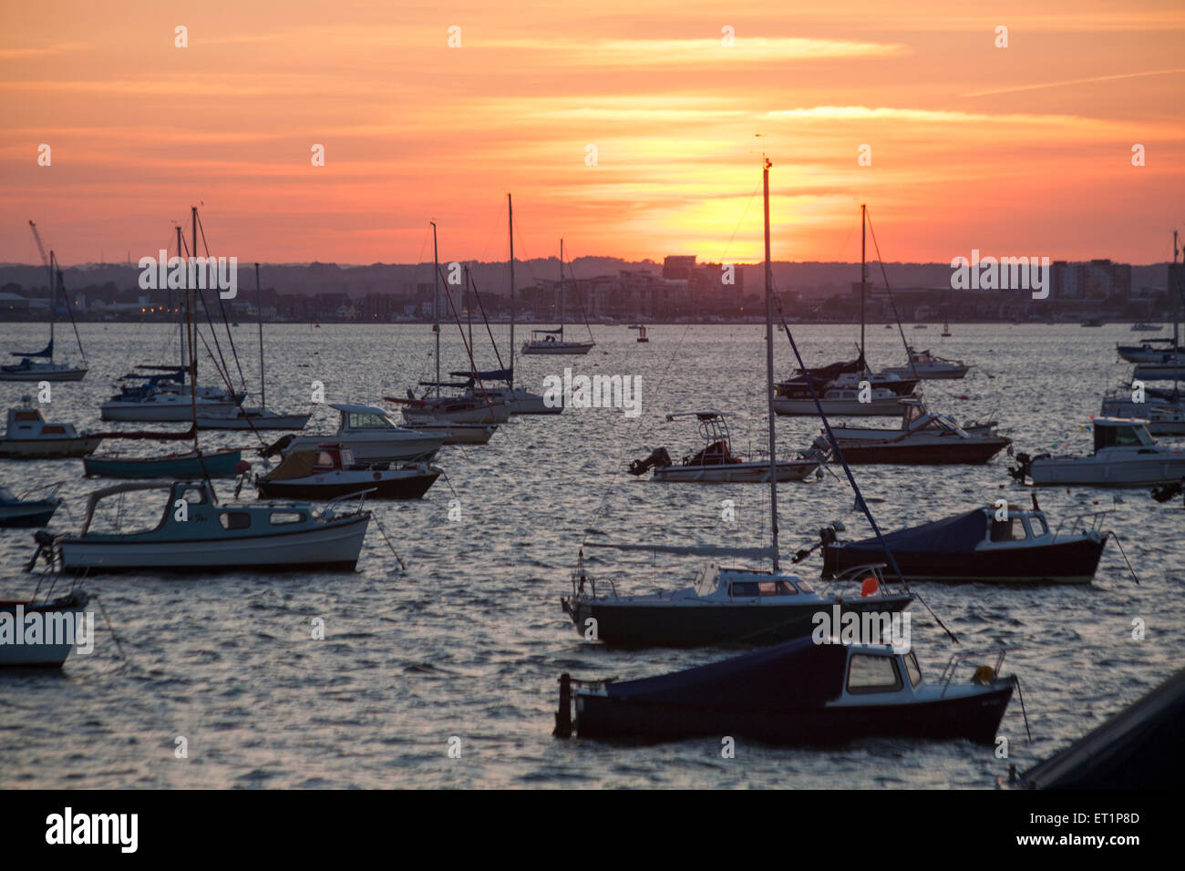 Sunset over poole harbour from sandbanks hi-res stock photography and ...