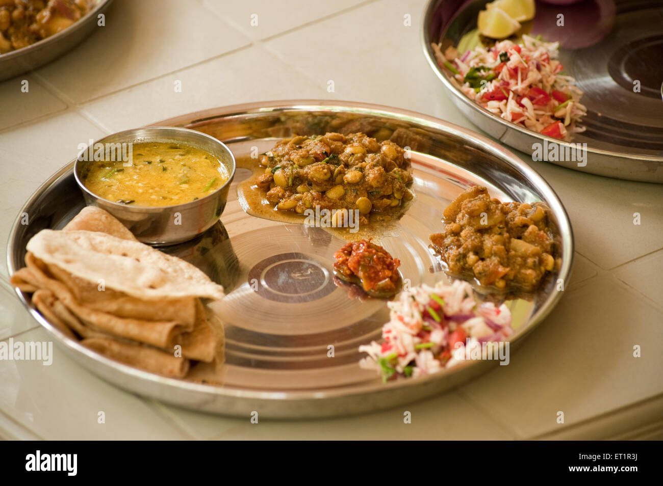 Konkani vegetarian thali lunch roti dal vegetable salad pickles india ...