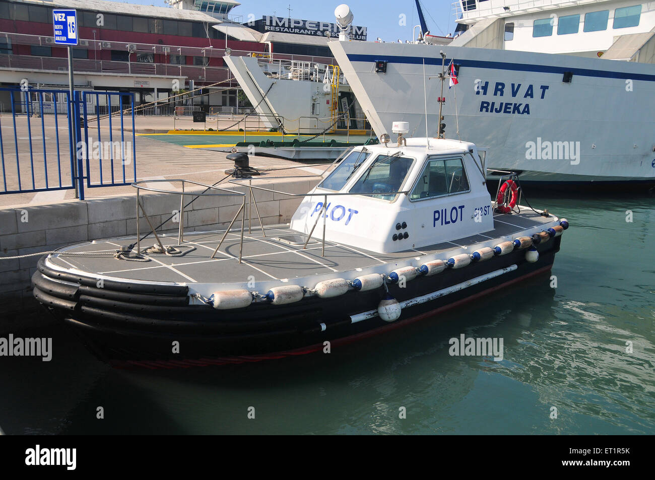 A harbor pilot boat is one of many different types of craft moored in ...
