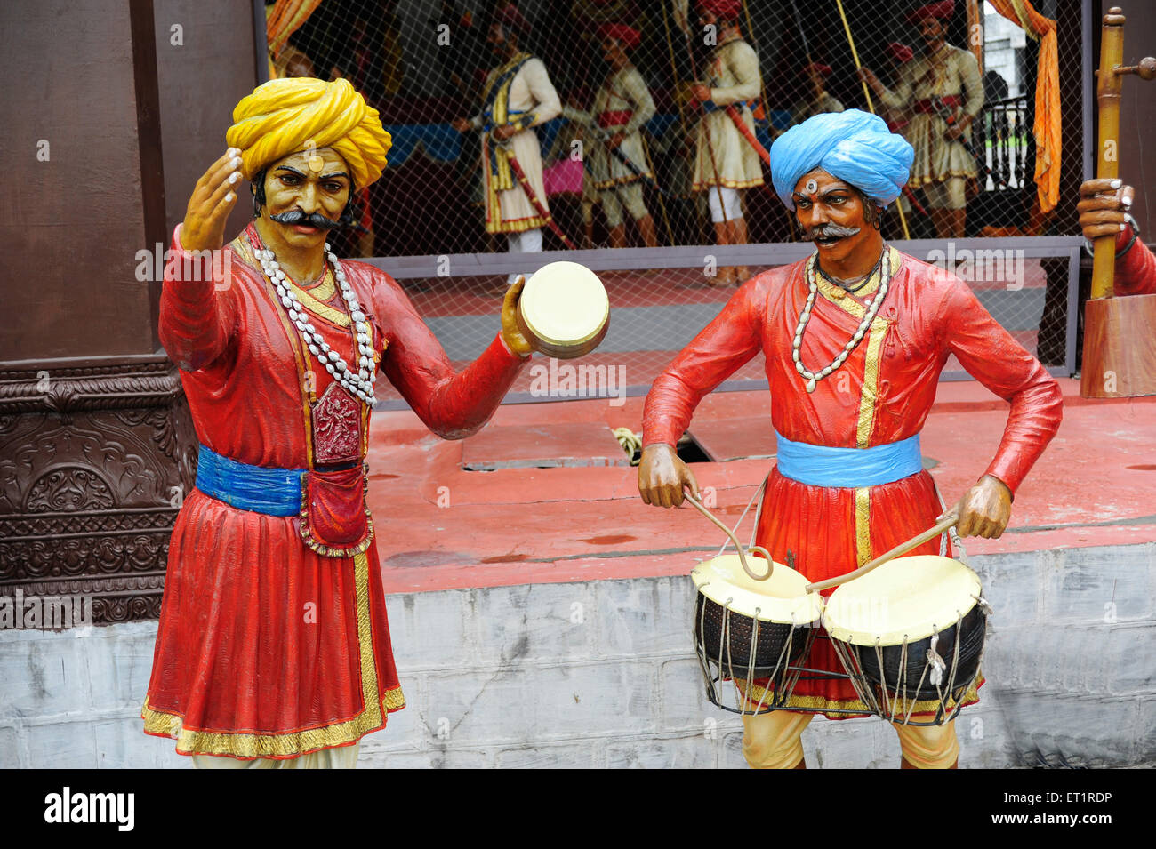 Statues of musicians playing duff nagada ; Akluj Fort ; Shivsrushti ...