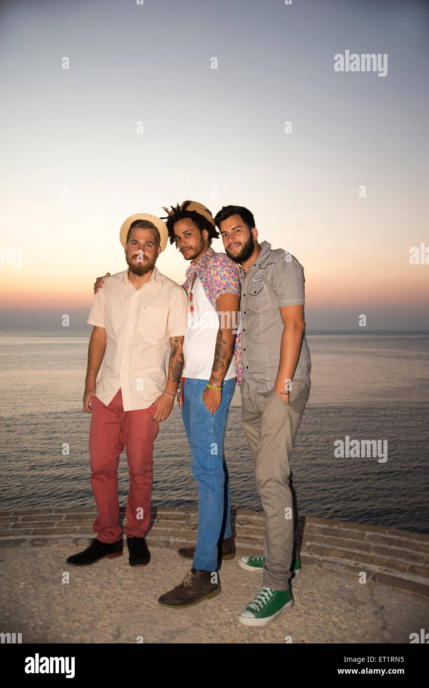 Male friends walking watching hi-res stock photography and images - Alamy