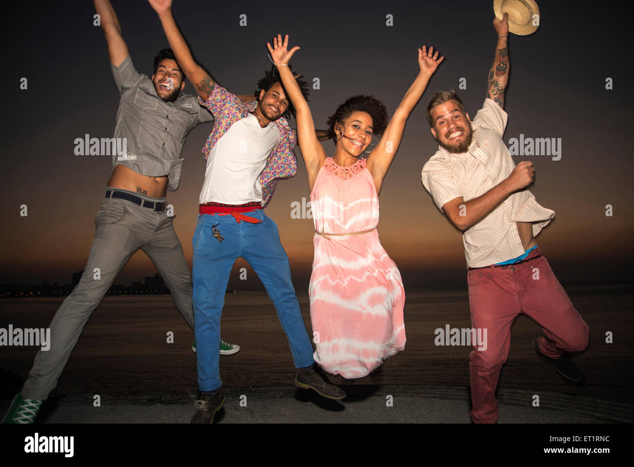 Four tourist friends having hi-res stock photography and images - Alamy