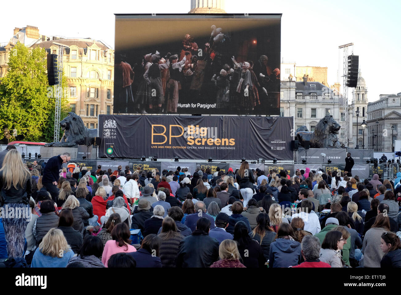 People watch opera on big screen beamed alive from the Royal Opera ...