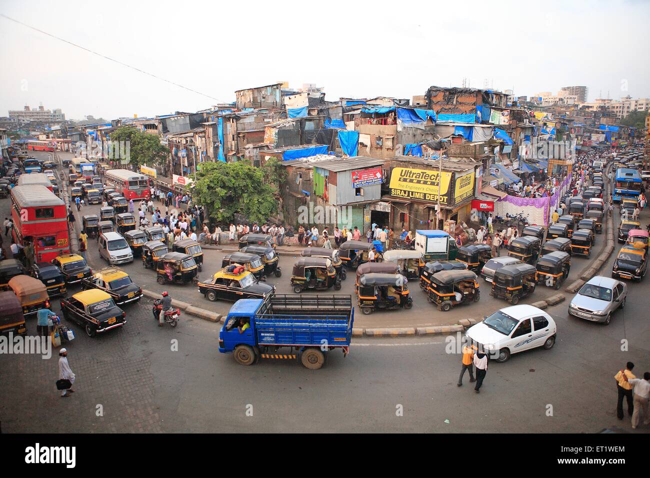 Skywalk ; slums and traffic at Behrampada ; Bandra ; Bombay Mumbai ...