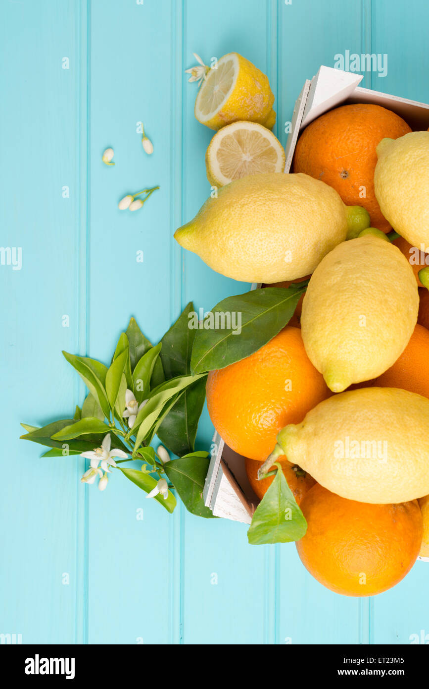 Citrus fresh fruits on wooden table background Stock Photo - Alamy