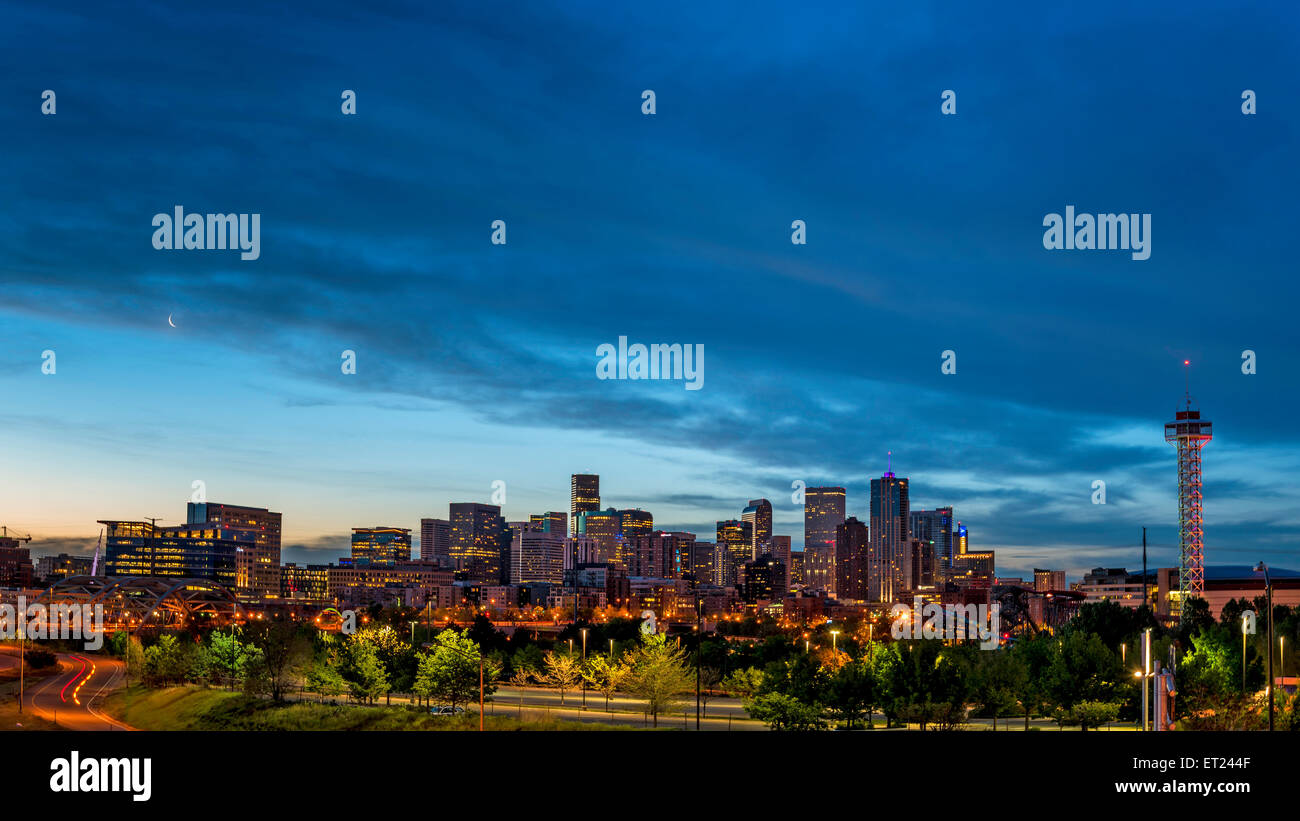 Moon over Denver in the morning twilight Stock Photo - Alamy