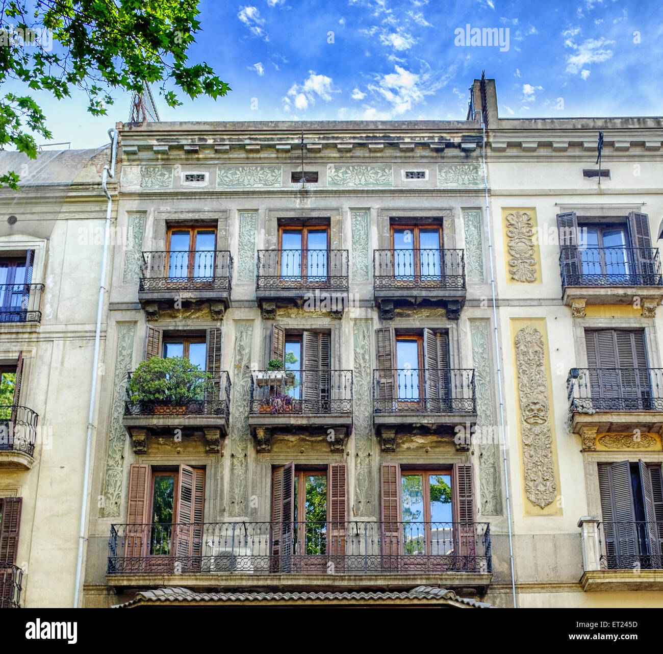 Facade of typical residential building in Eixample district, Barcelona ...