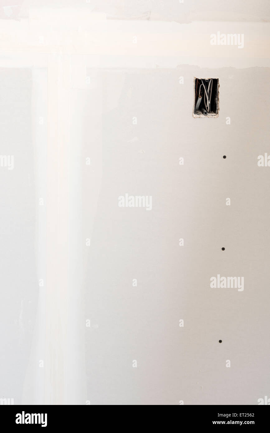 Rough wired electrical outlet and dry wall Stock Photo - Alamy