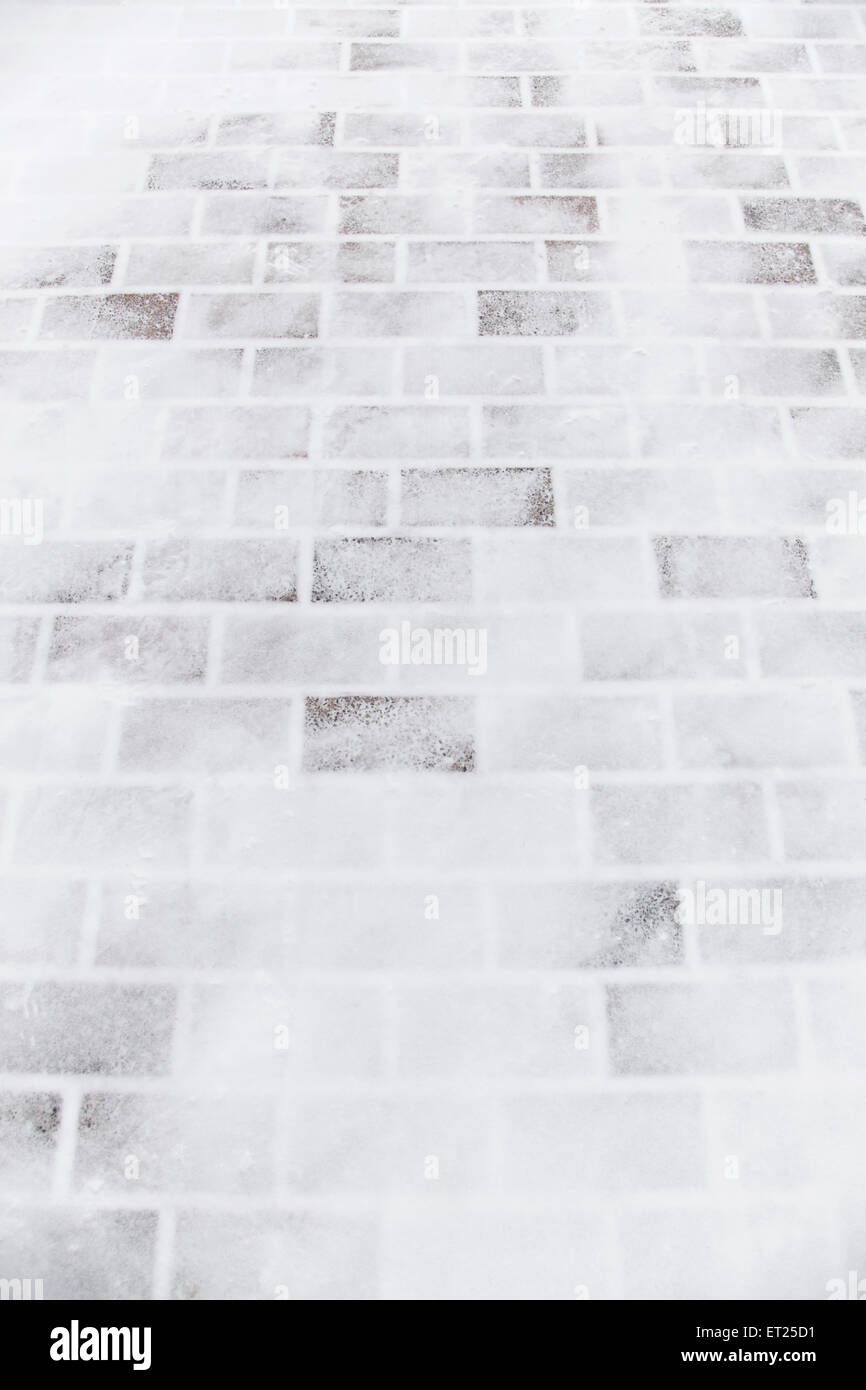 Light snow on a walkway, Winter Background Stock Photo - Alamy