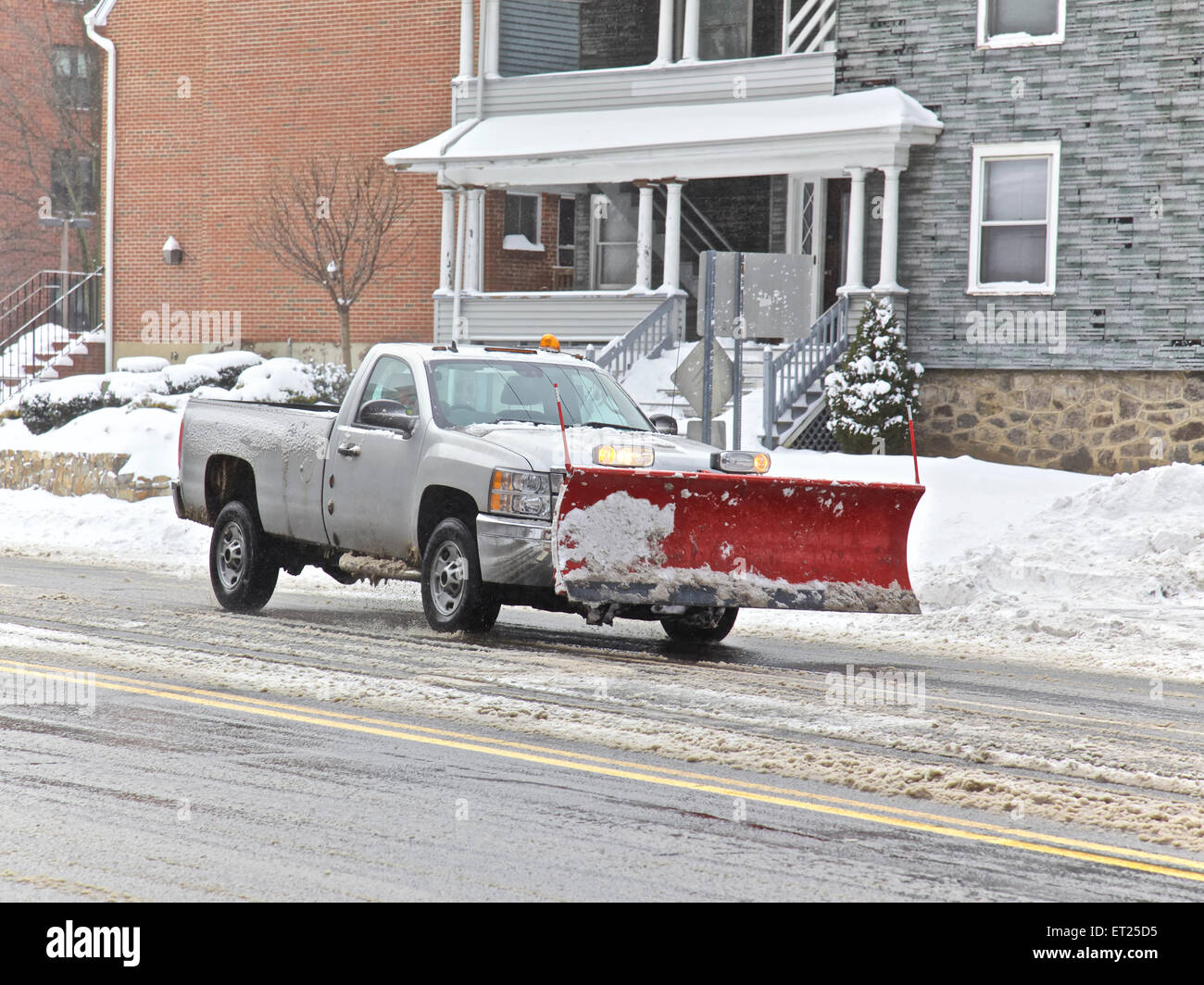 Snow removal clearing roads, Winter storm Stock Photo - Alamy